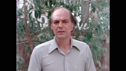 1980s: Man talking outside in front of a... | Stock Video | Pond5