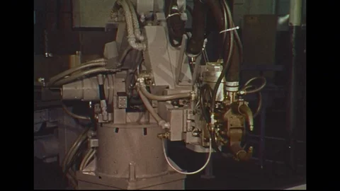 1980s: robotic arm in factory. It move... | Stock Video | Pond5