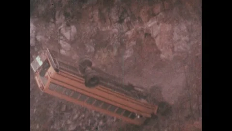 1980s: School bus falls down cliff and c... | Stock Video | Pond5