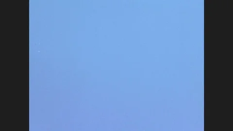 1980s: UNITED STATES: blue screen. Absor... | Stock Video | Pond5