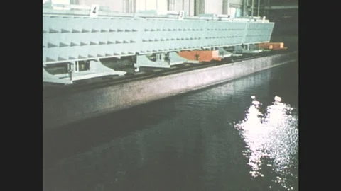1980s: Wave pool. Model boat floats in ... | Stock Video | Pond5