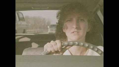 1980s: Woman driving car. Woman holding ... | Stock Video | Pond5