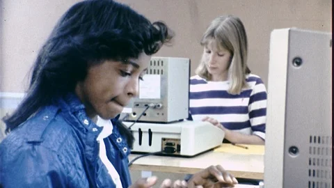 1980s Young Women Study Computer Program... | Stock Video | Pond5