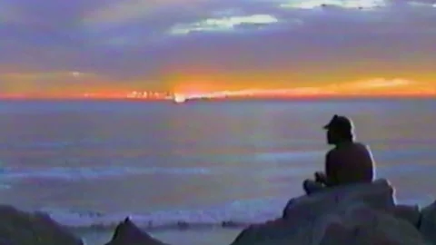 1989 Vintage VHS Man Watching Sunset Bea... | Stock Video | Pond5
