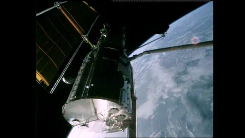 1990 - Astronauts conduct an EVA on the ... | Stock Video | Pond5