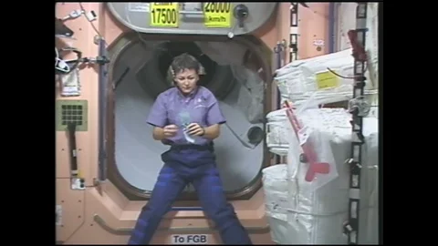 1990s: Astronaut throws paper flipper in... | Stock Video | Pond5