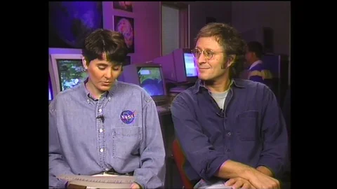 1990s: Computer lab. Man and woman spea... | Stock Video | Pond5