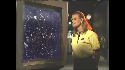 1990s: Science museum, girl stands by ma... | Stock Video | Pond5