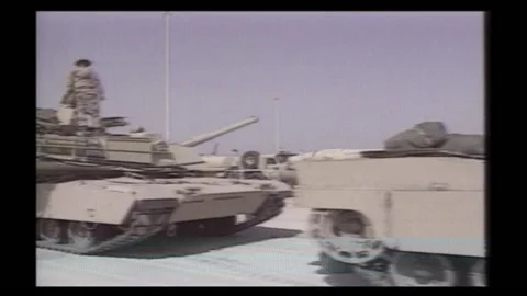 1991 Abrams Tanks driving around base in... | Stock Video | Pond5
