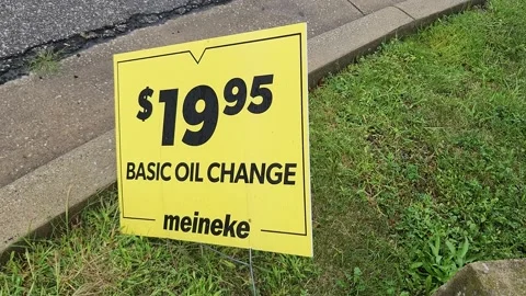 $19.95 Basic Oil Change Signage Meineke | Stock Video | Pond5