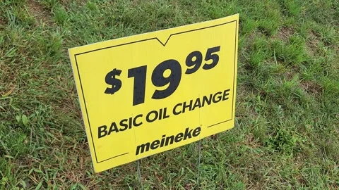 $19.95 Basic Oil Change Signage Meineke | Stock Video | Pond5