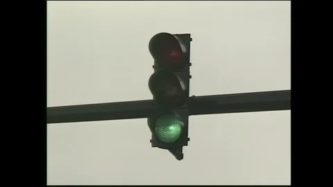 2000s: traffic light turns from red to g... | Stock Video | Pond5