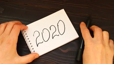 2020 Hands write a word close-up | Stock Video | Pond5