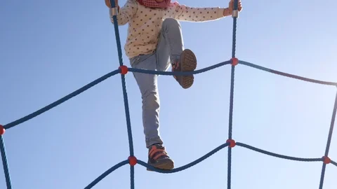 24 Rope web climbing and crawling little... | Stock Video | Pond5