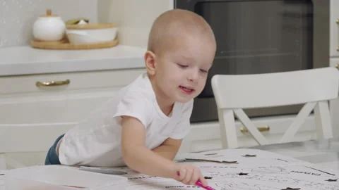 3-year-old child drawing with felt tip p... | Stock Video | Pond5