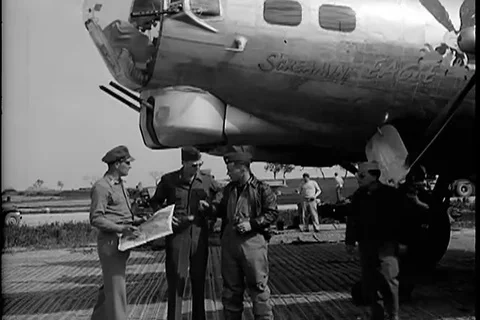301st Bomb Group discuss map near B-17 F... | Stock Video | Pond5