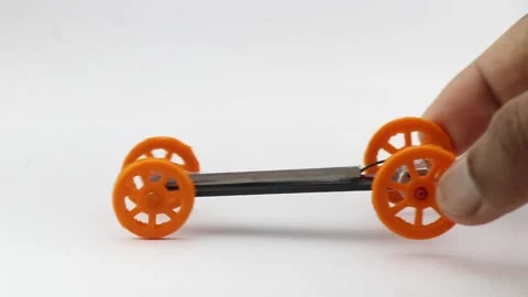 3D printed model car wheels moving forwa... | Stock Video | Pond5