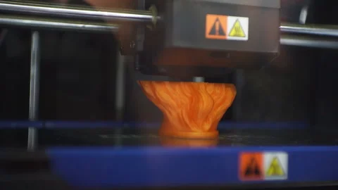 3D printer in action. Create shapes usin... | Stock Video | Pond5