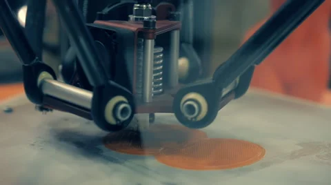 3D printer prints from orange plastic th... | Stock Video | Pond5