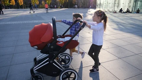 4 Brother and sister children pushing to... | Stock Video | Pond5