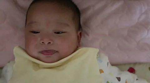 4 months old baby girl drooling and blow... | Stock Video | Pond5