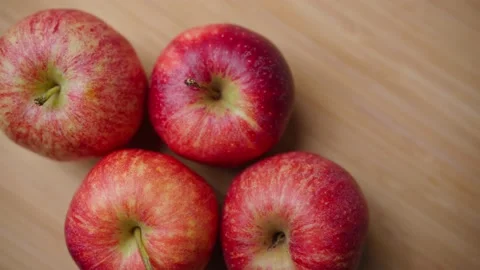 4 Red Apples on display | Stock Video | Pond5