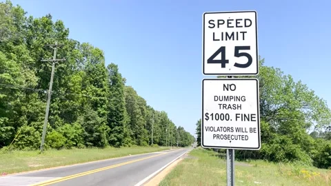 45 speed limit sign at a 4 way intersect... | Stock Video | Pond5