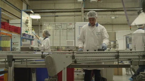 4K 4K Workers on a production line | Stock Video | Pond5