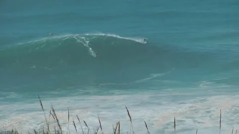 4K aerial birds eye view of some surfer ... | Stock Video | Pond5