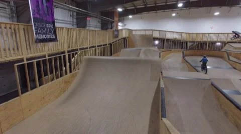 4k aerial bmx x-up rising view | Stock Video | Pond5