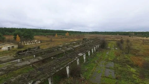 4K Aerial. Destroyed cowhouse struc... | Stock Video | Pond5