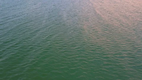 4K Aerial. Fly up over ocean, sea surfa... | Stock Video | Pond5