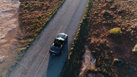 4k Aerial Flying Above White Convertible... | Stock Video | Pond5