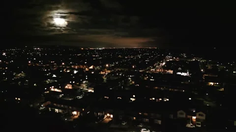 4K aerial, moon rising, urban with cloud... | Stock Video | Pond5