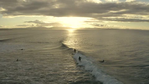 4k Aerial shot of happy surfers out in t... | Stock Video | Pond5
