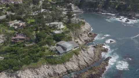 4K aerial view of cliff side homes and c... | Stock Video | Pond5