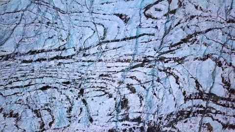 4K aerial view of a glacier. Top down vi... | Stock Video | Pond5