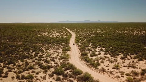 4K Aerial view of SUV driving through th... | Stock Video | Pond5