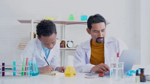 4K, African male student sits on a scien... | Stock Video | Pond5