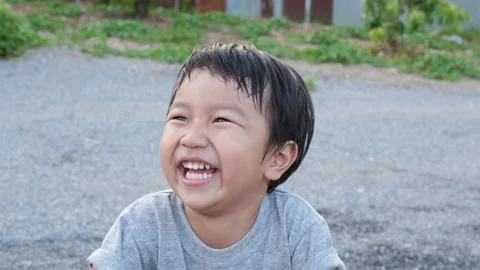 4K Asian cute child boy laughing with ha... | Stock Video | Pond5