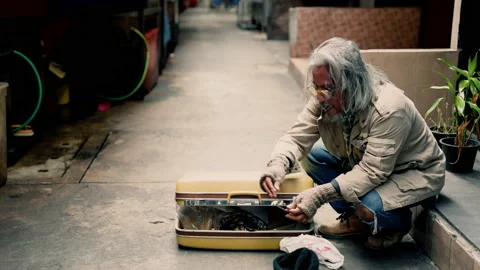 4K, Asian homeless old man Sharing bread... | Stock Video | Pond5