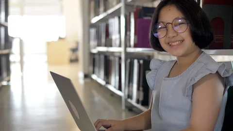 4K Asian student searching data in schoo... | Stock Video | Pond5