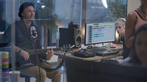 4K Band recording a track in the studio ... | Stock Video | Pond5