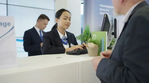 Bank Worker Stock Video Footage | Royalty Free Bank Worker Videos | Pond5