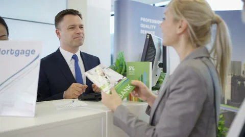 Bank Worker Stock Video Footage | Royalty Free Bank Worker Videos | Pond5