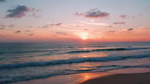 4K Beautiful tropical beach with sunset ... | Stock Video | Pond5