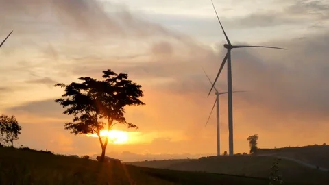 4K beautiful wind turbine in twilight su... | Stock Video | Pond5