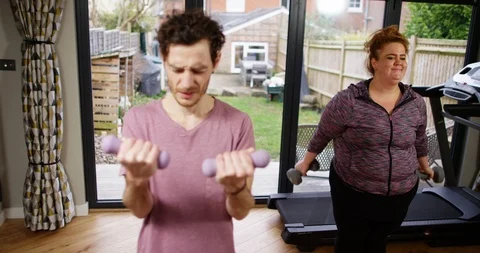 4K Big woman lifting weights easily & sk... | Stock Video | Pond5