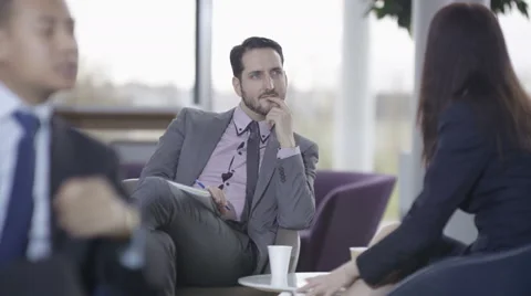 4K Business man & woman in discussion in... | Stock Video | Pond5