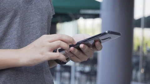 4k Businessmen sit and use smart phones ... | Stock Video | Pond5